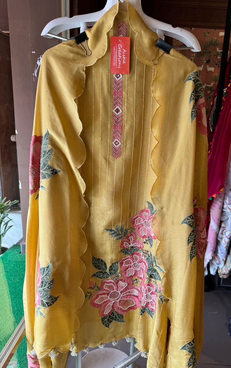 The shirt front has very beautiful floral embroidered boota with pearl ...